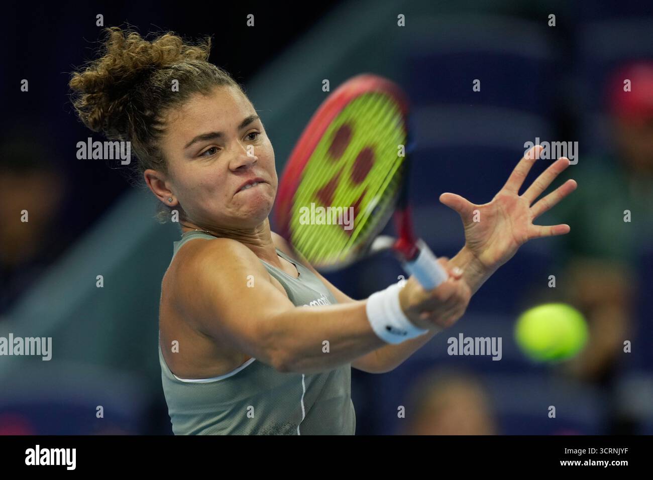 Jasmine Paolini, of Italy plays a forehand return to Amanda Anisimova ...