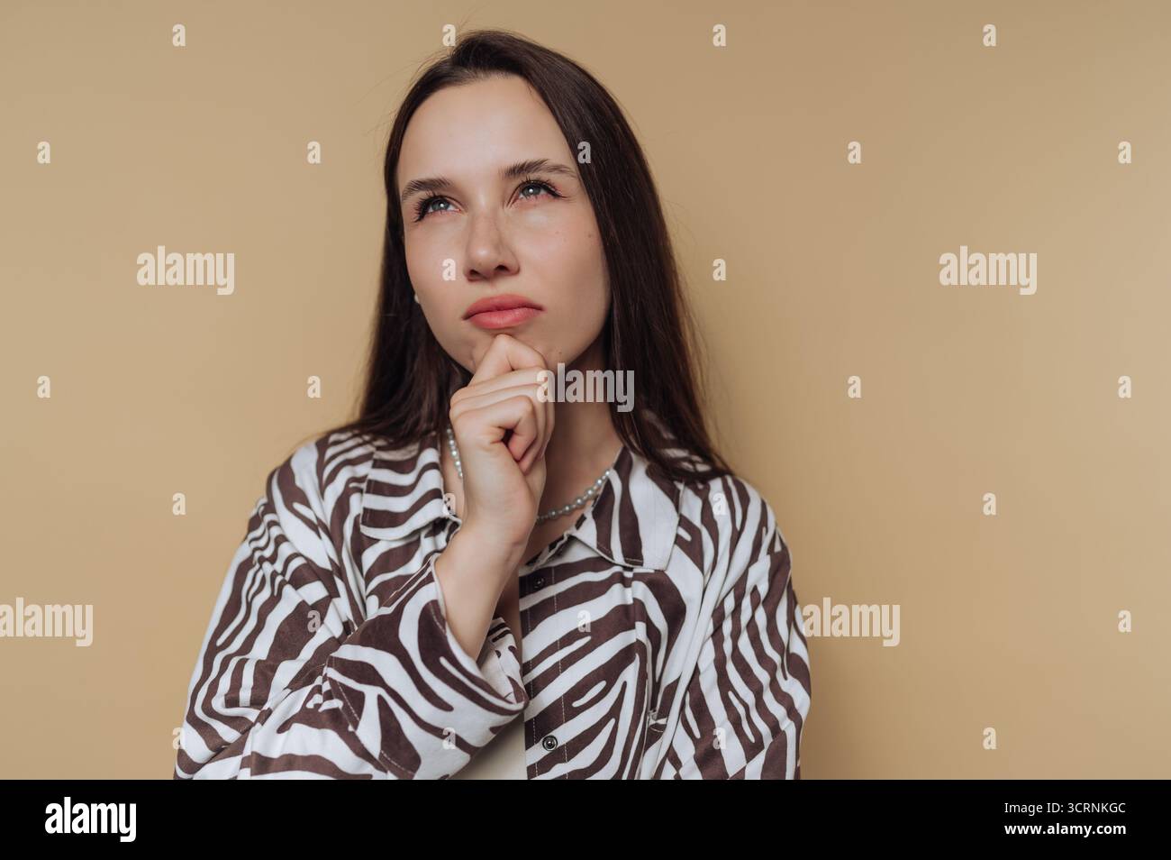 Woman in patterned shirt hi-res stock photography and images - Alamy
