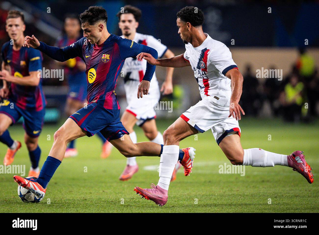 Pedro GONZALEZ LOPEZ (Pedri) of Barcelona and Warren ZAIRE-EMERY of PSG ...