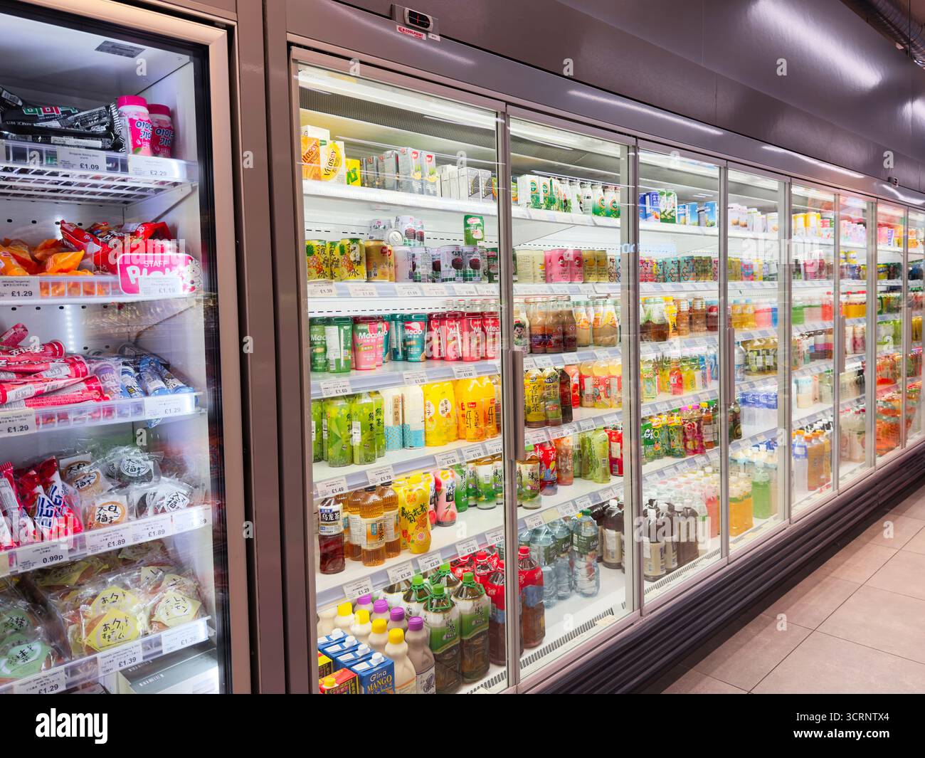 Manchester, UK - September 25, 2025: A long supermarket fridge aisle ...