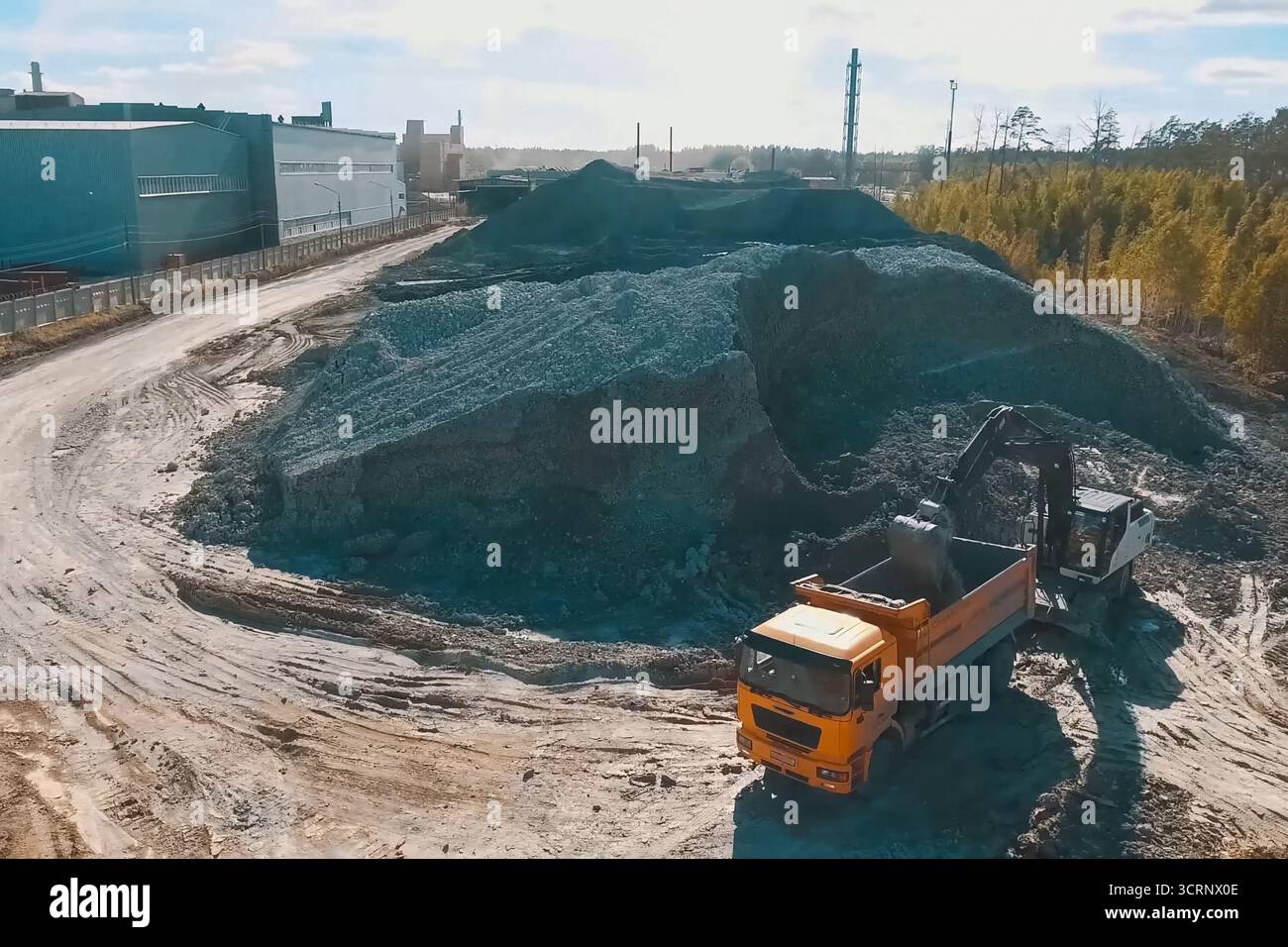 Excavator pours clay dump hi-res stock photography and images - Alamy