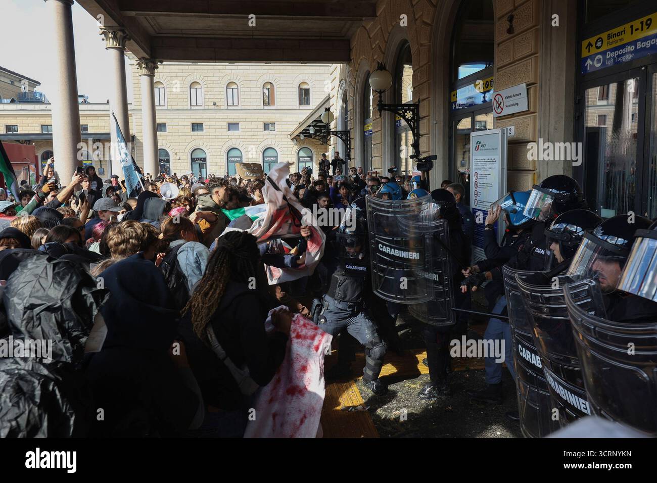 Students clash with police in riot gear during a march in support of ...