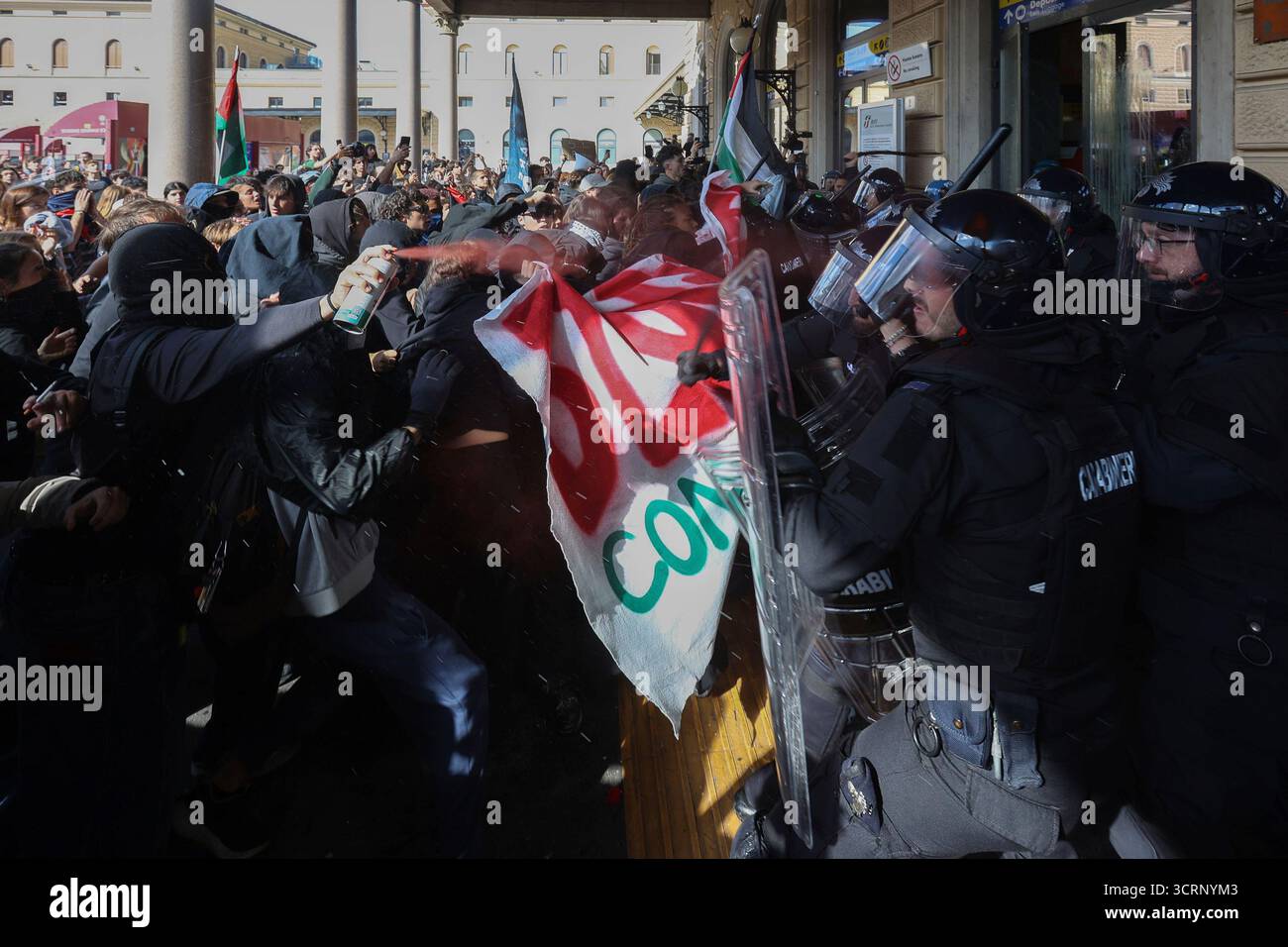 Students clash with police in riot gear during a march in support of ...
