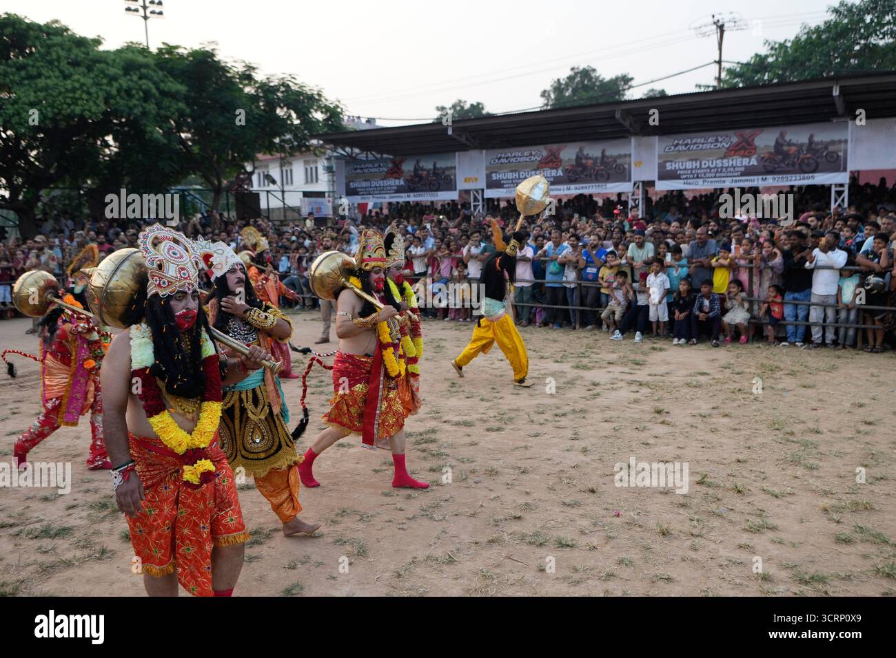 Artists dressed up as Hindu gods shout religious slogans during ...