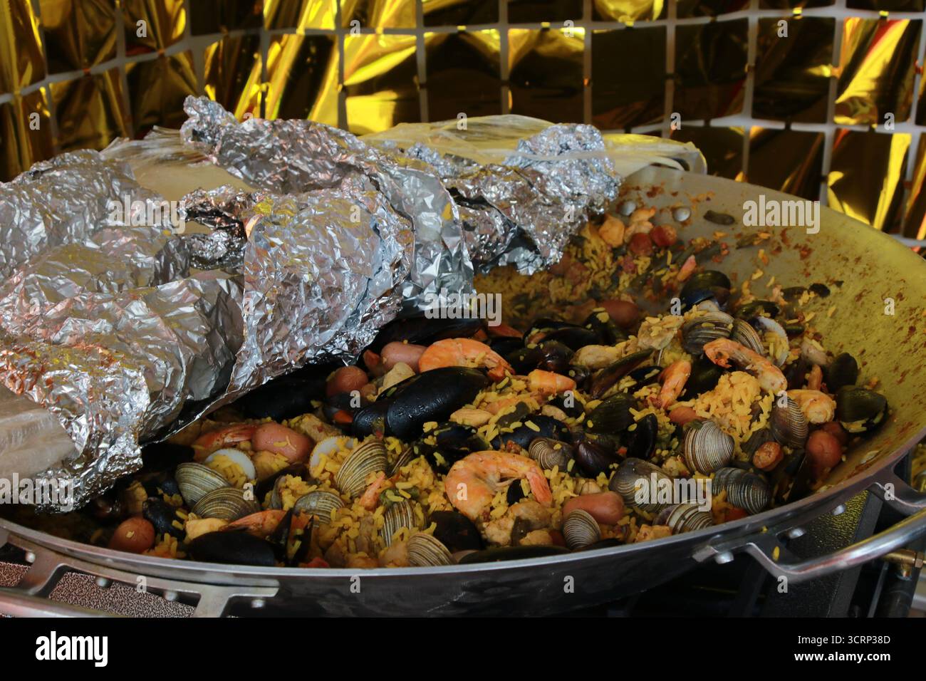 A casserole of paella, a popular dish from Spain, is seen during the ...