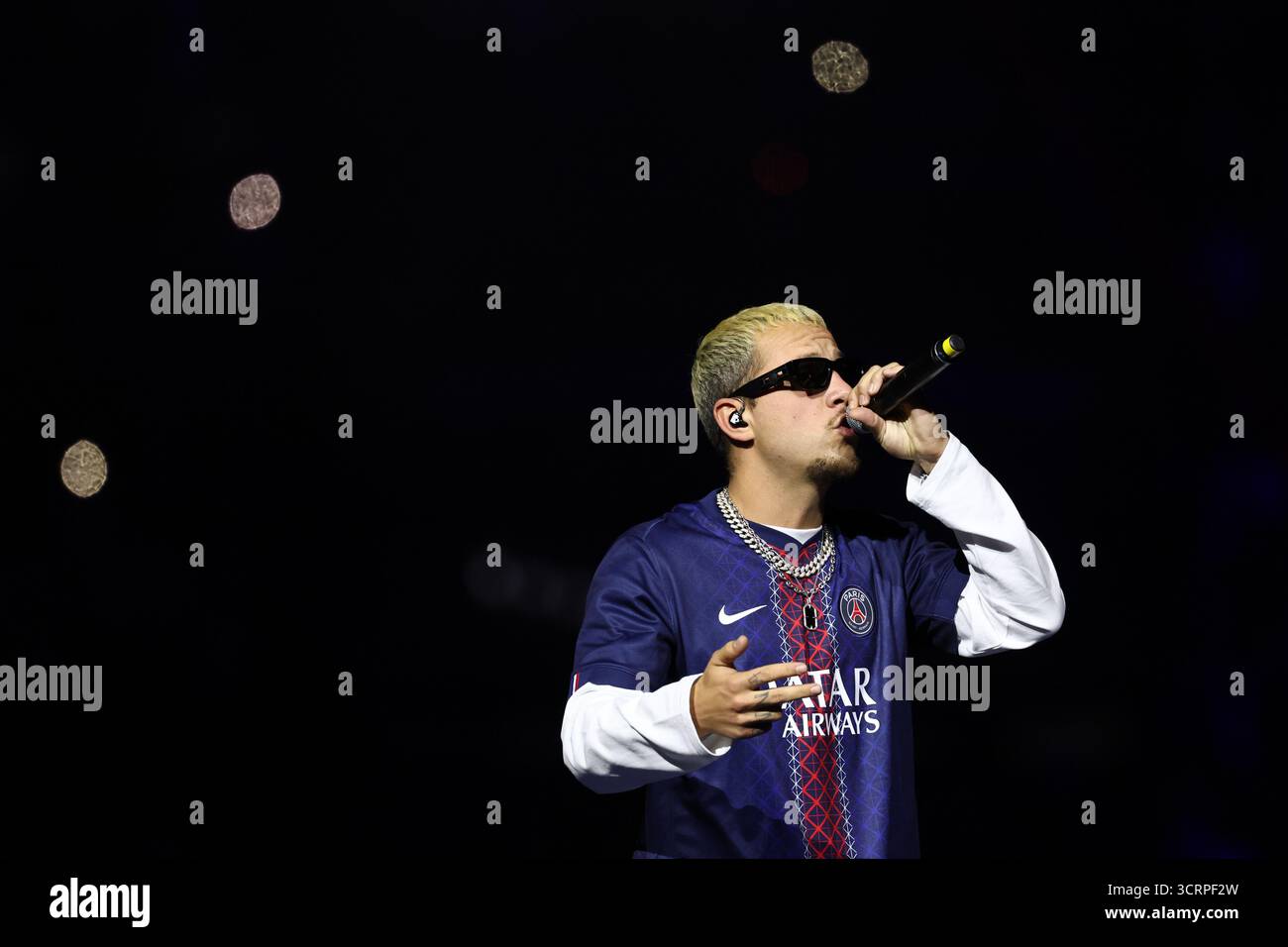 French rapper PLK performs after the French L1 football match between Paris Saint-Germain (PSG ...