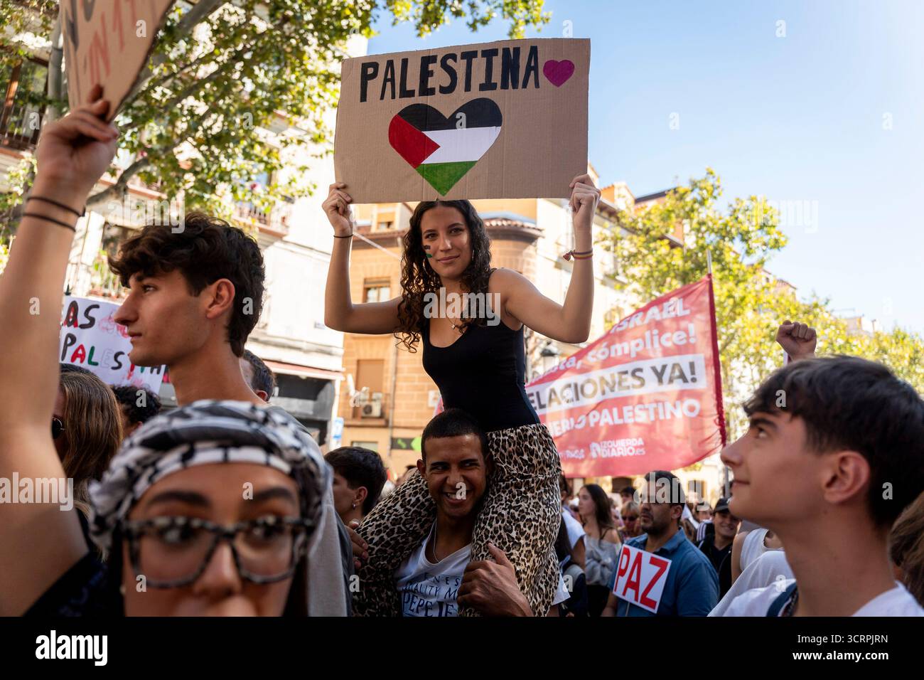 A protester hold a banner with the slogan 'Palestina' during the ...