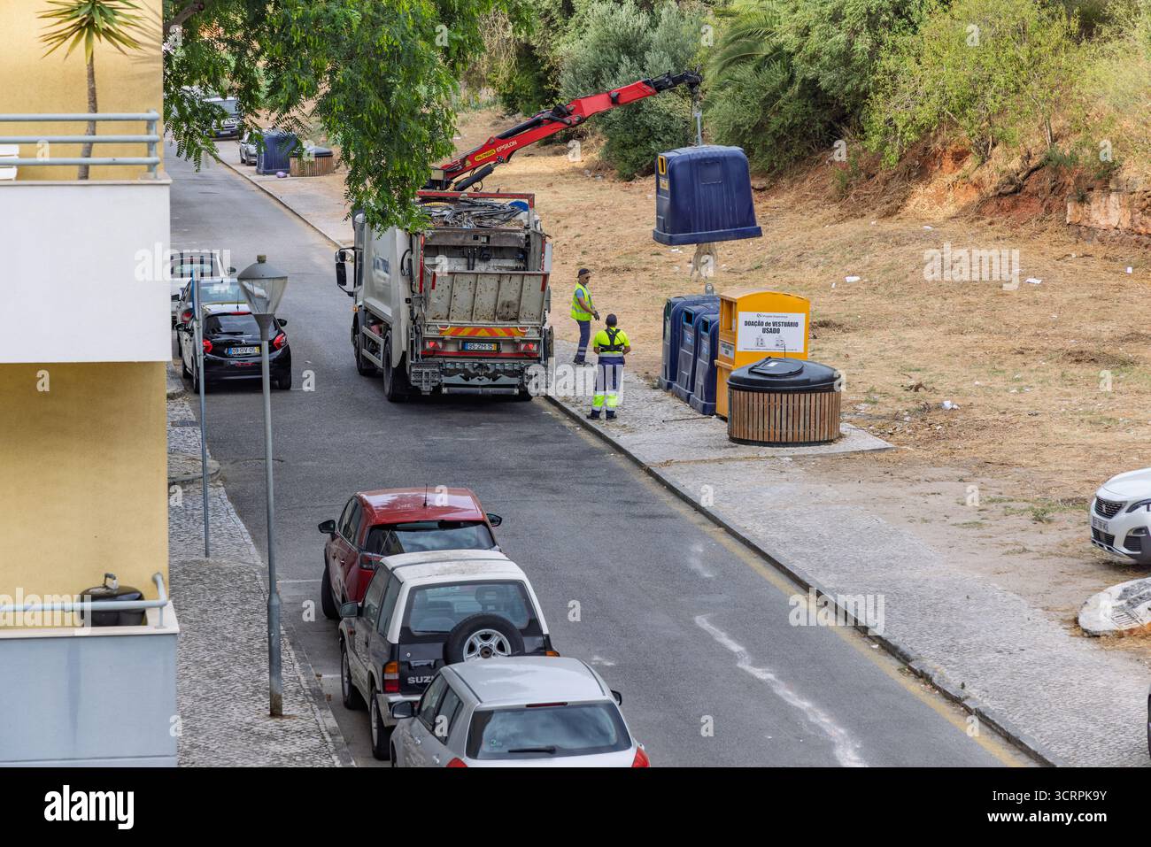 Garbage truck crane shown hi-res stock photography and images - Alamy