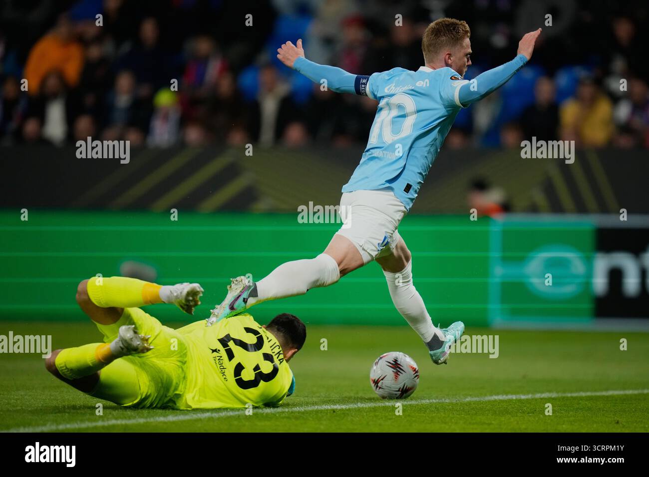 Plzen's goalkeeper Martin Jedlicka stops Malmo's Anders Christiansen ...