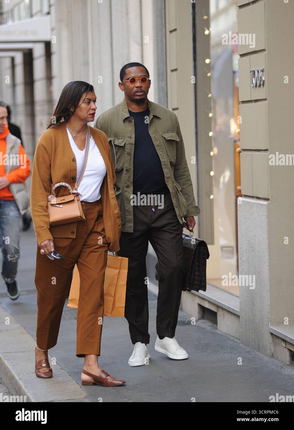 Milan, Samuel Eto'o and his wife Georgette arrive downtown for a shopping spree Stock Photo - Alamy