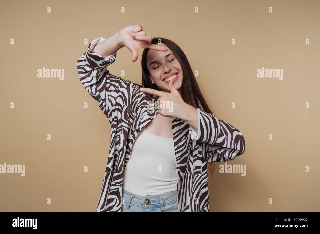 Woman posing framing gesture against hi-res stock photography and ...