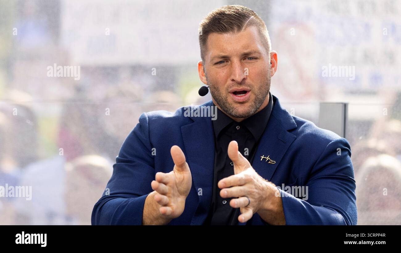 FILE - Tim Tebow talks to his co-hosts during the SEC Nation broadcast ...