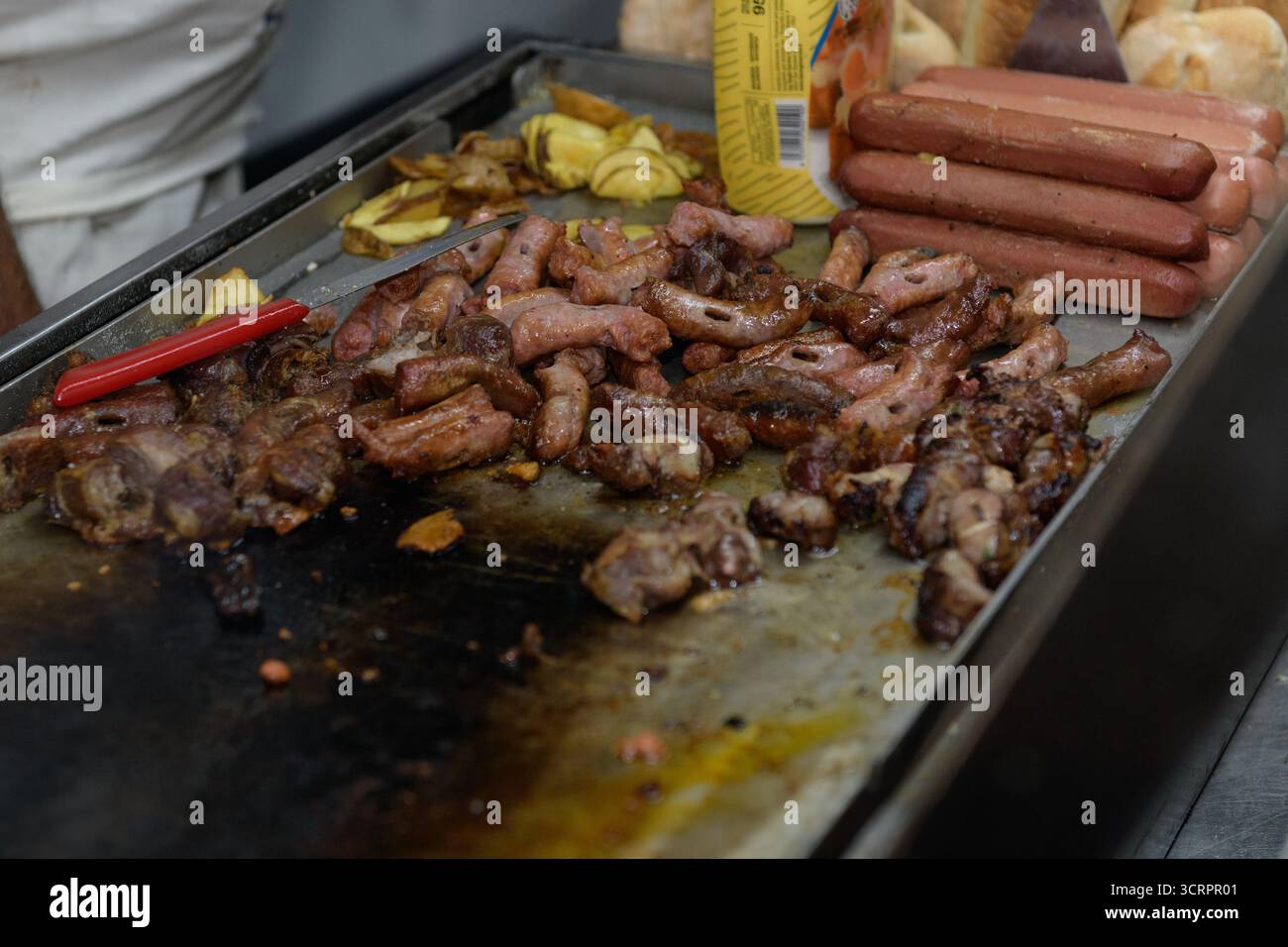 Cooked meats in street hi-res stock photography and images - Alamy