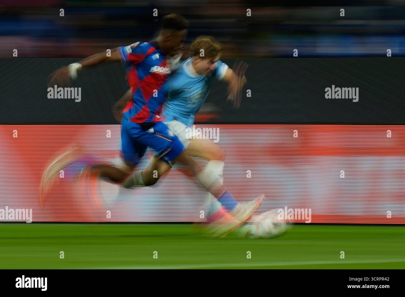 Plzen's Sampson Dweh, left, and Malmo's Hugo Bolin challenge for the ...