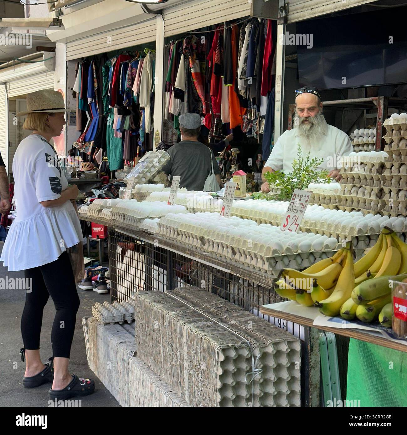 Haifa, Israel, 12 June 2025, An Orthodox Jewish vendor sells eggs at ...