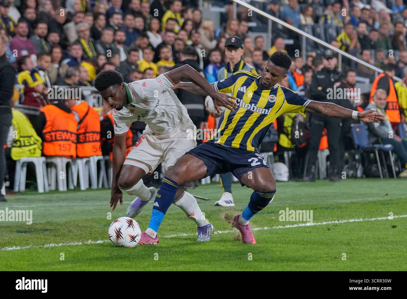 Nice's Mohamed-Ali Cho, left, vies for the ball with Fenerbahce's ...