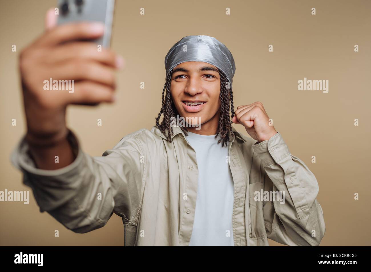 Young individual joyfully captures hi-res stock photography and images ...