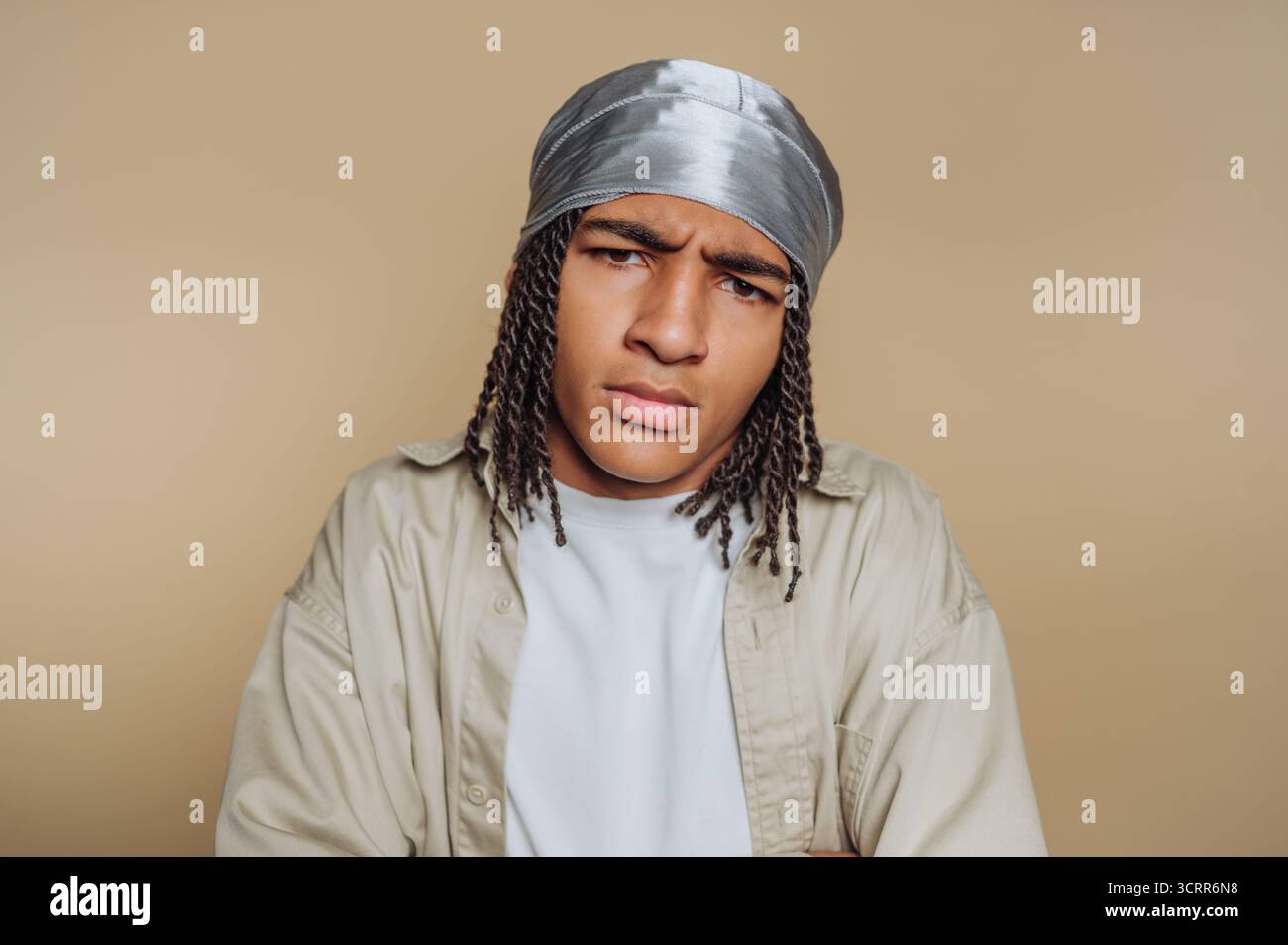 Young man african descent displays hi-res stock photography and images ...