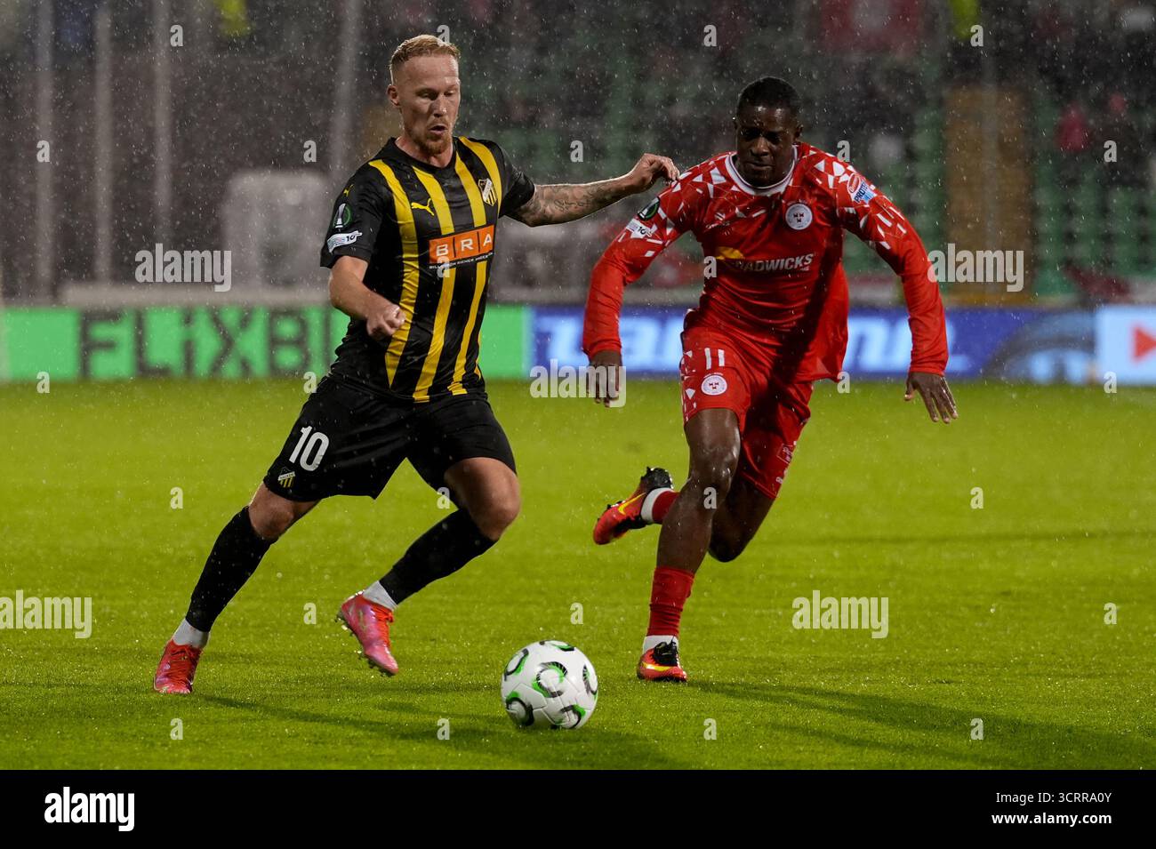 BK Hacken's Mikkel Rygaard (left) and Shelbourne FC's Mipo Odubeko ...