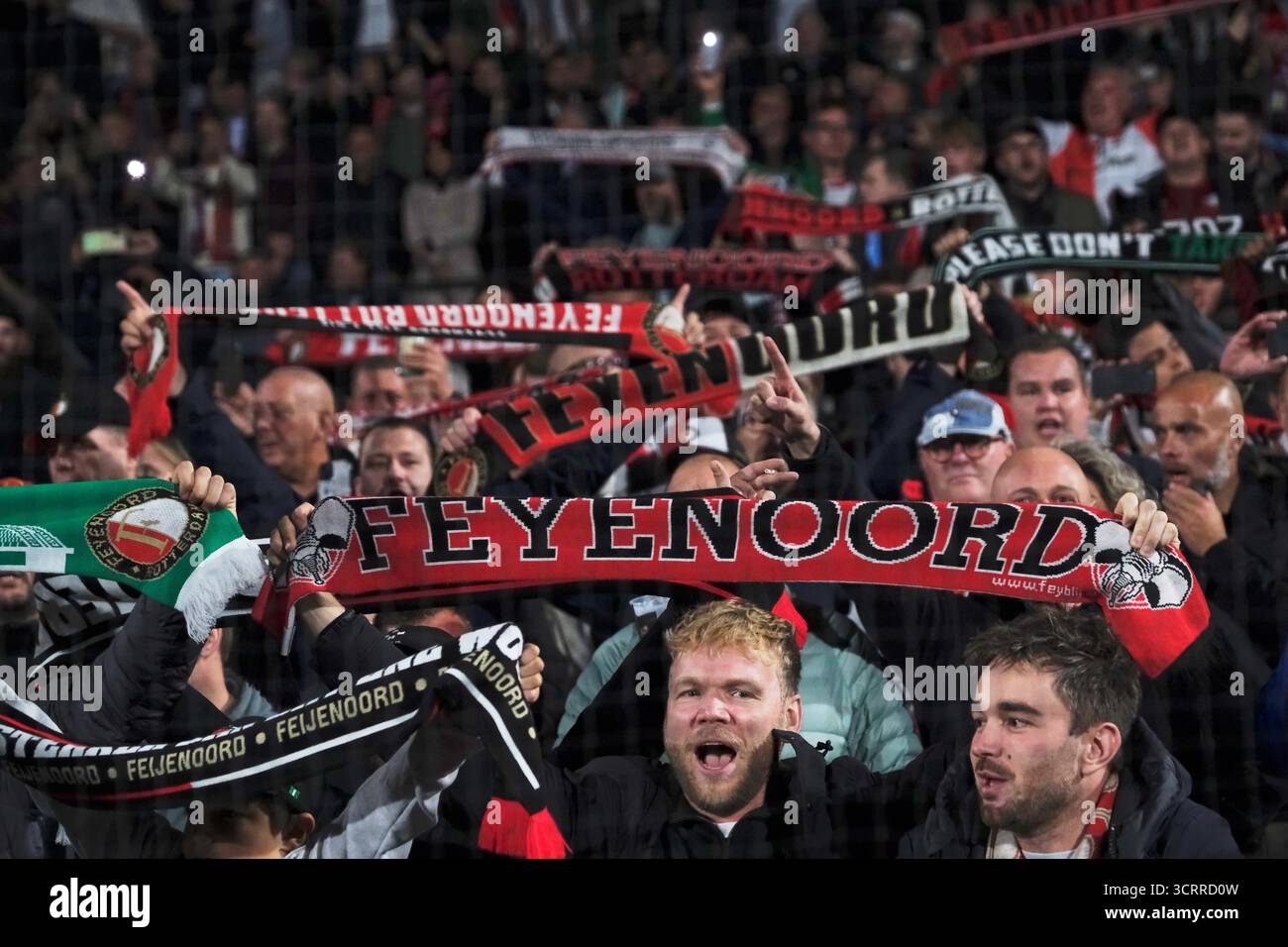 Fans cheer prior to the Europa League opening phase soccer match between Feyenoord and Aston ...