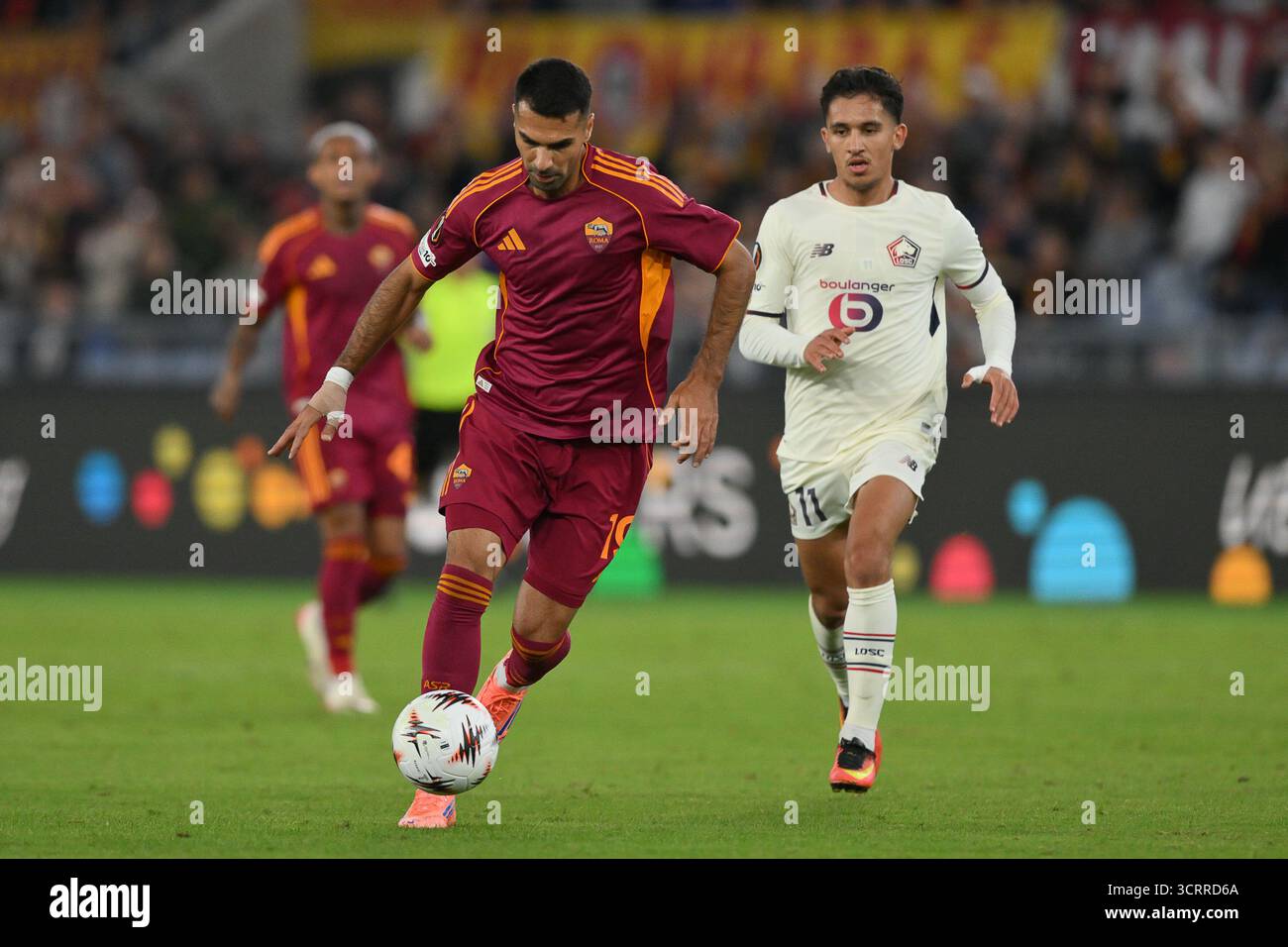 Zeki celik of as roma runs with the ball hi-res stock photography and ...