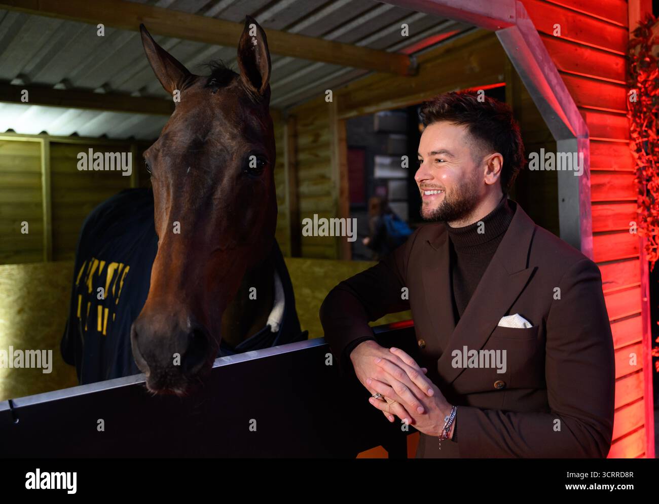 EDITORIAL USE ONLY Chris Hughes meets former racehorse Coneygree at St ...