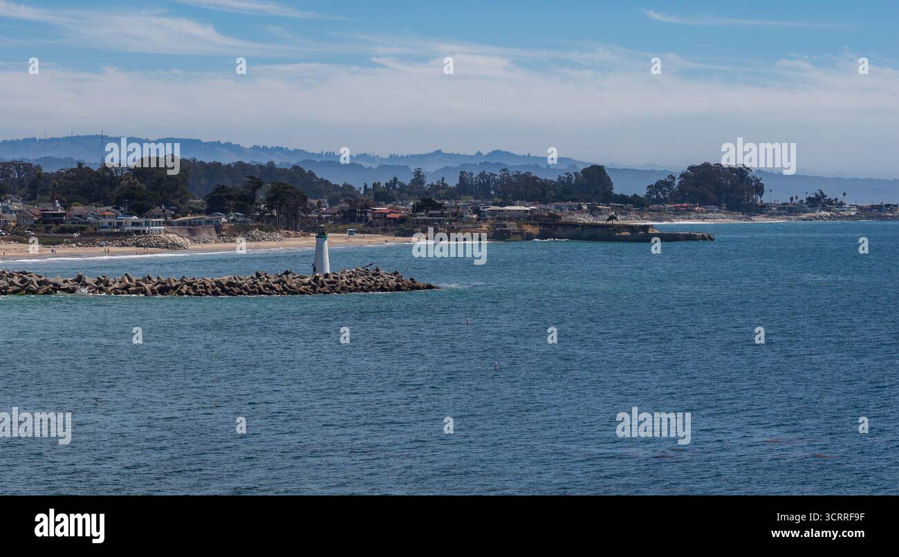 Coastal View of Santa Cruz with Lighthouse on Rocky Jetty Stock Photo ...