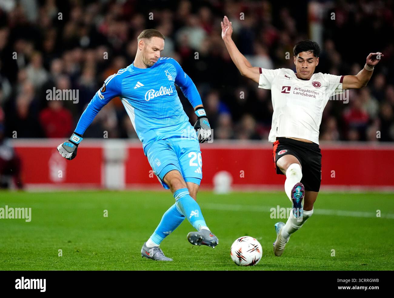 Nottingham Forest goalkeeper Matz Sels kicks clear from Midtjylland's ...