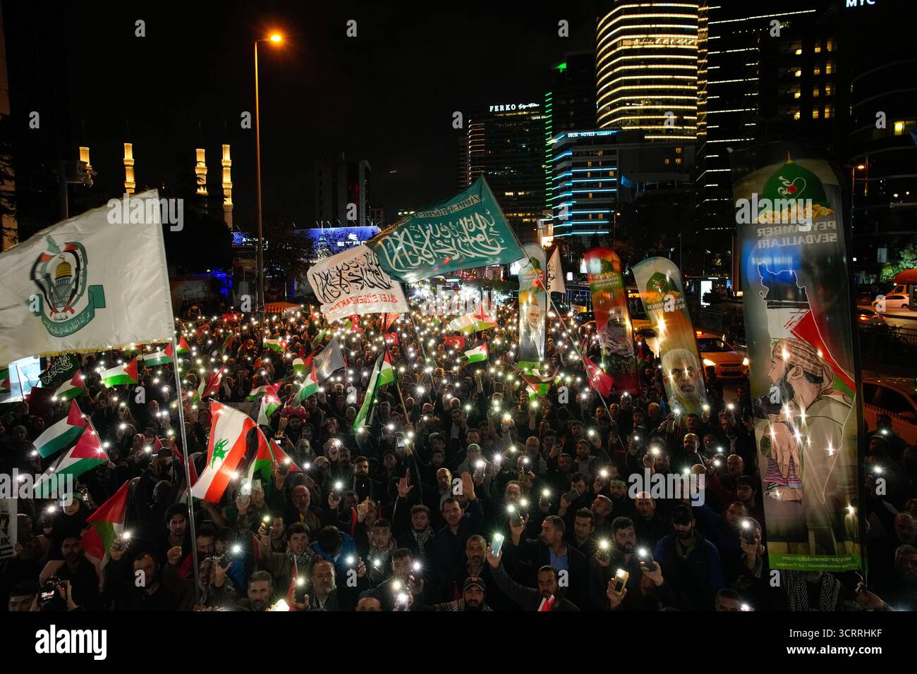 People gather in front of the Israel consulate during a protest against ...