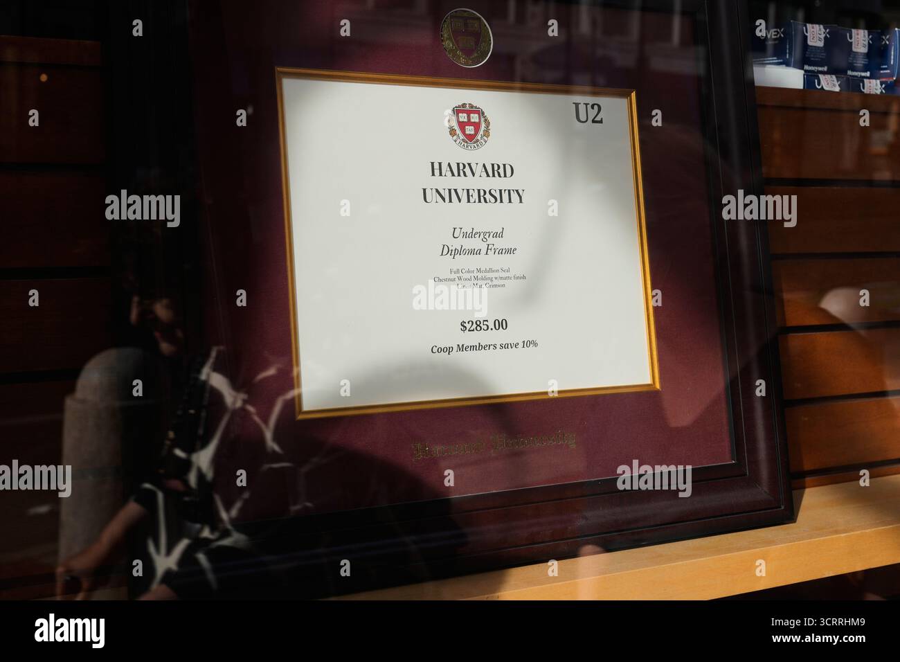 A frame for a Harvard University diploma is displayed at a store ...