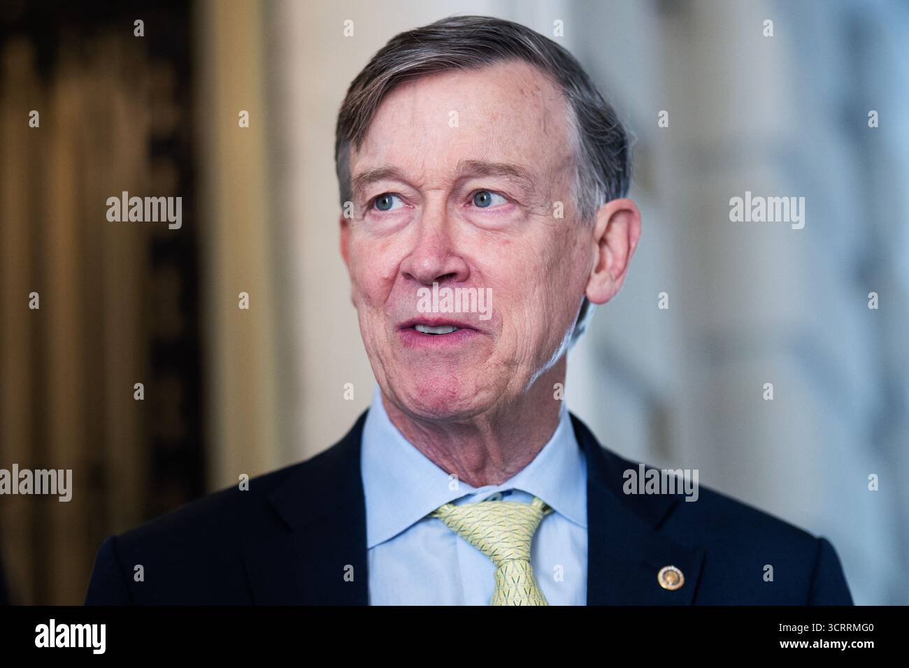UNITED STATES - OCTOBER 1: Sen. John Hickenlooper, D-Colo., talks with ...
