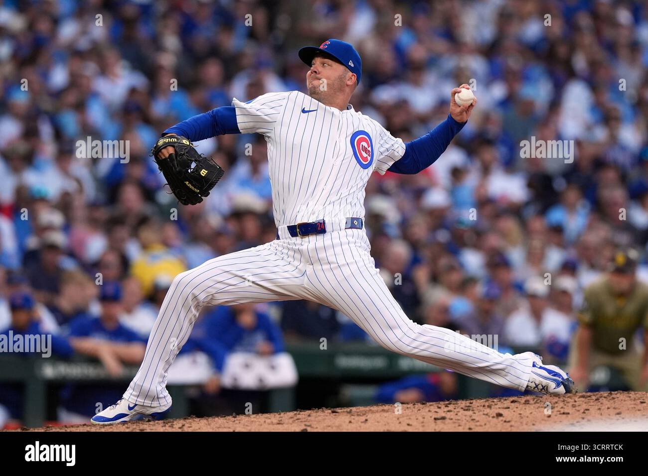 Chicago Cubs' Caleb Thielbar thorws during the fifth inning of Game 3 ...