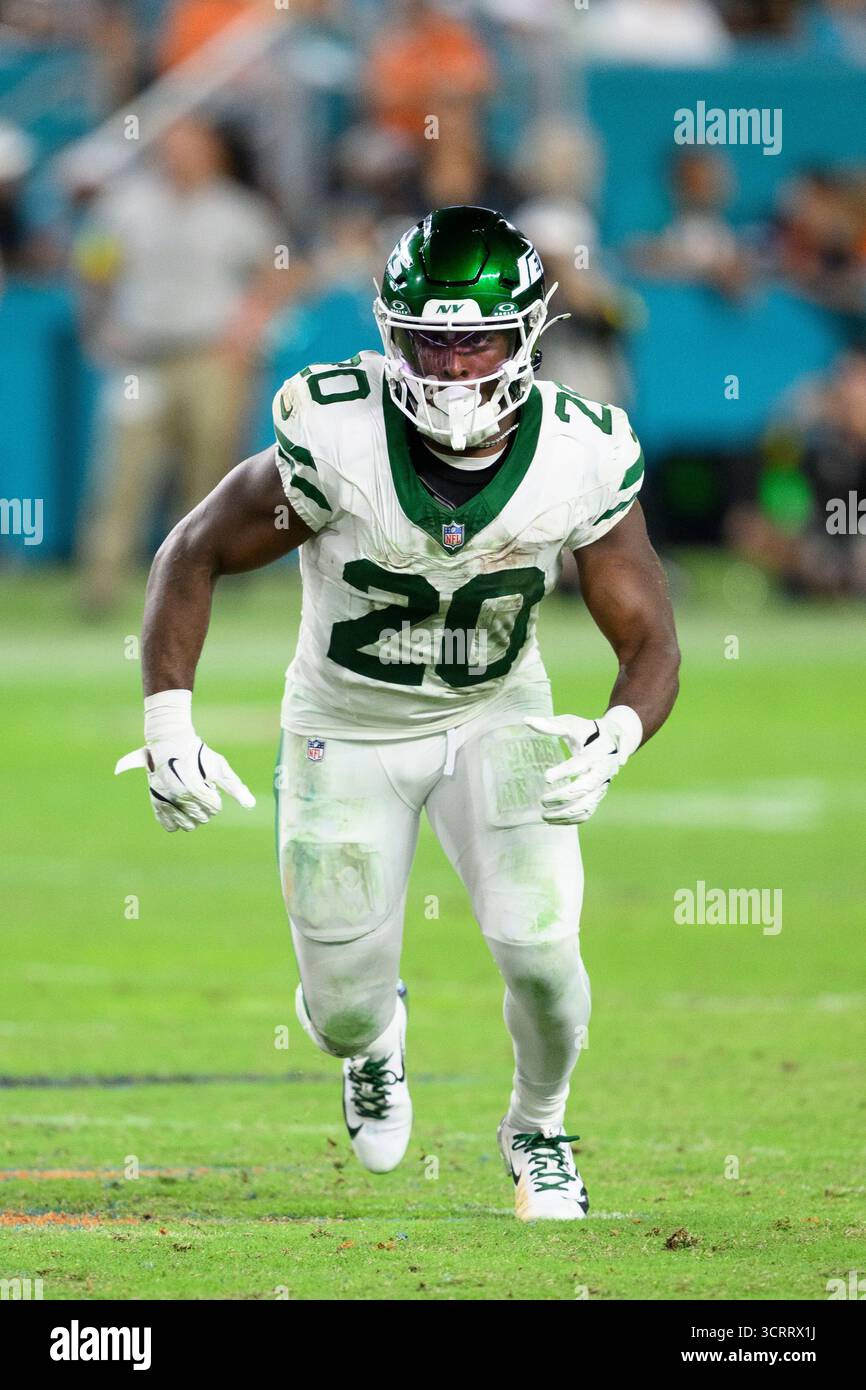 New York Jets running back Breece Hall (20) runs ' play during an NFL ...