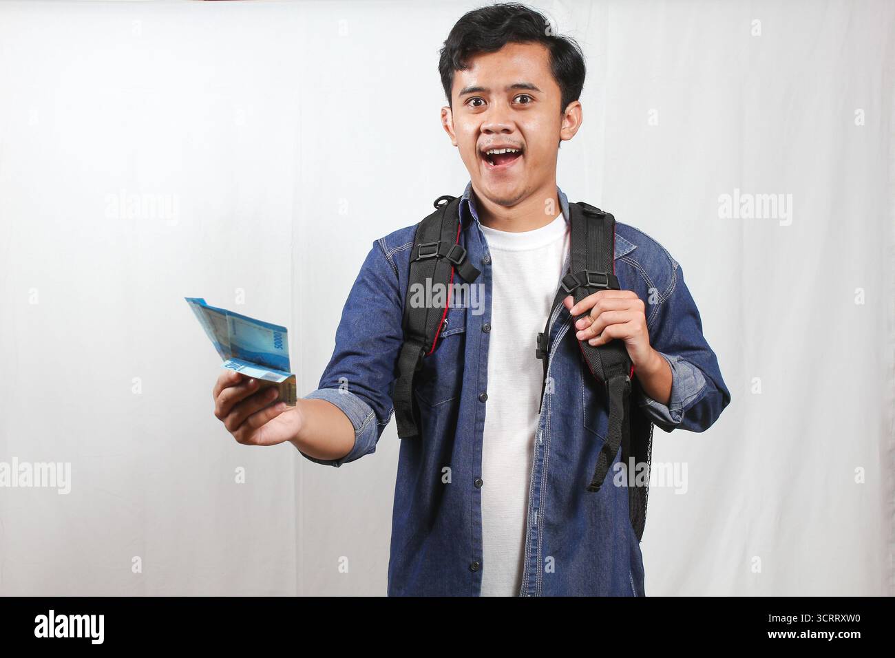 Indonesian rupiah money bag hi-res stock photography and images - Alamy