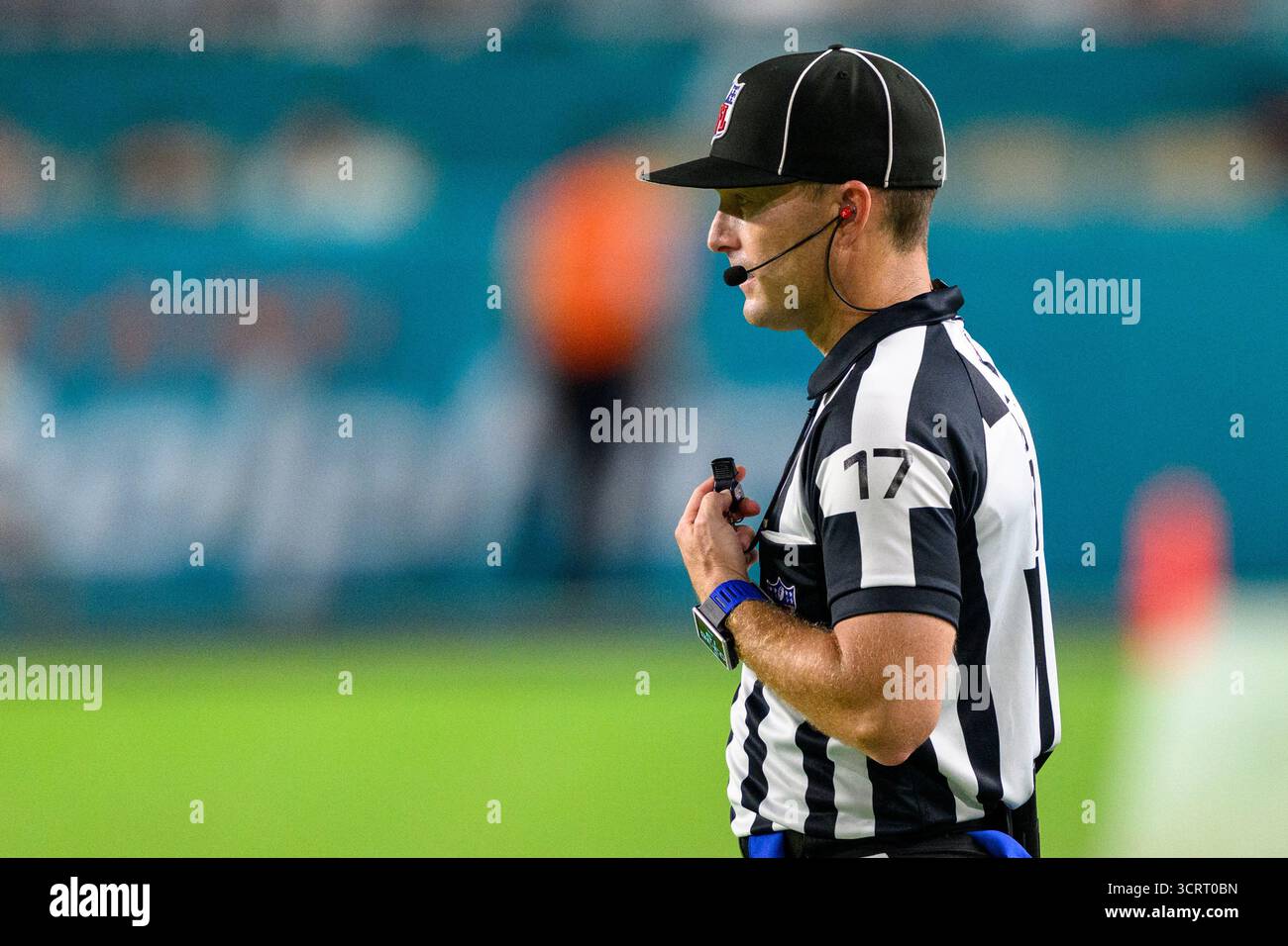 NFL line judge Brett Bergman watched on the field during an NFL ...