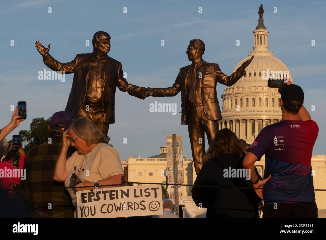 A statue depicting President Donald Trump, left, and Jeffrey Epstein ...