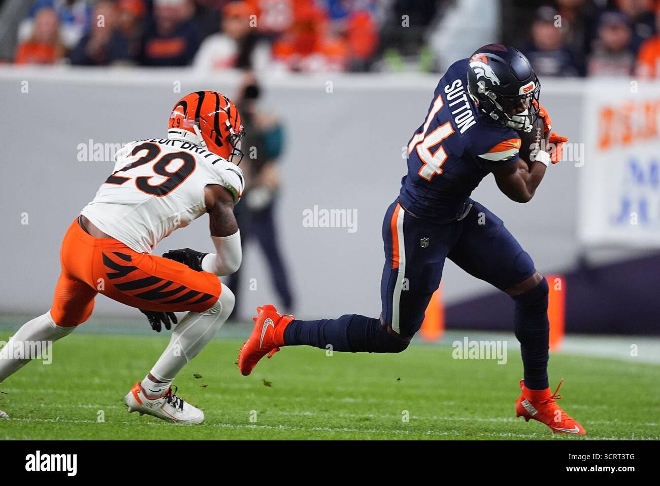 Cincinnati Bengals cornerback Cam Taylor-Britt (29) pursues Denver ...