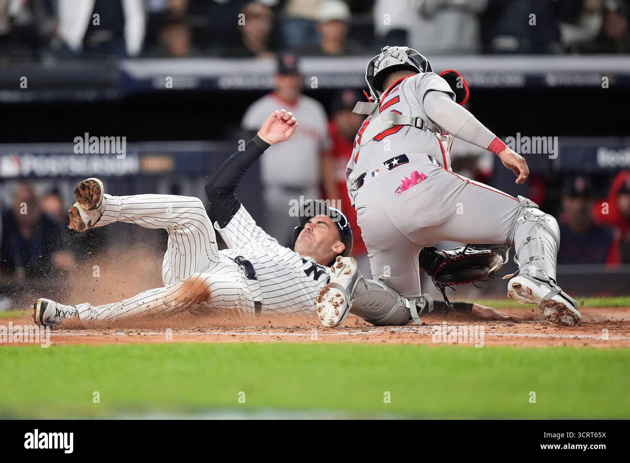 New York Yankees' Cody Bellinger slides safely into home plate to score ...