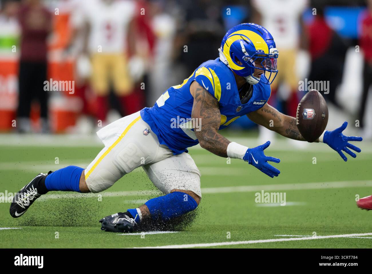 Los Angeles Rams running back Blake Corum (22) fumbles the ball during an NFL football game ...