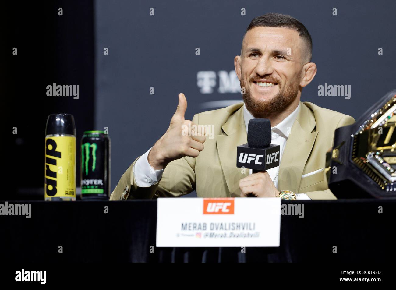 UFC bantamweight champion Merab Dvalishvili, of Georgia, gives a thumbs ...