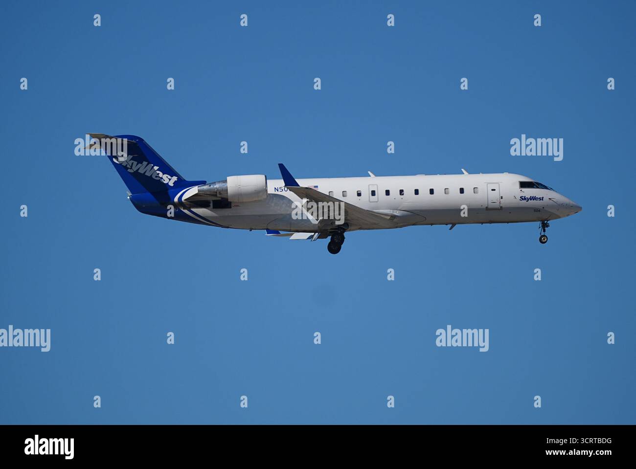 SkyWest Airlines commuter jet lands at Denver International Airport ...