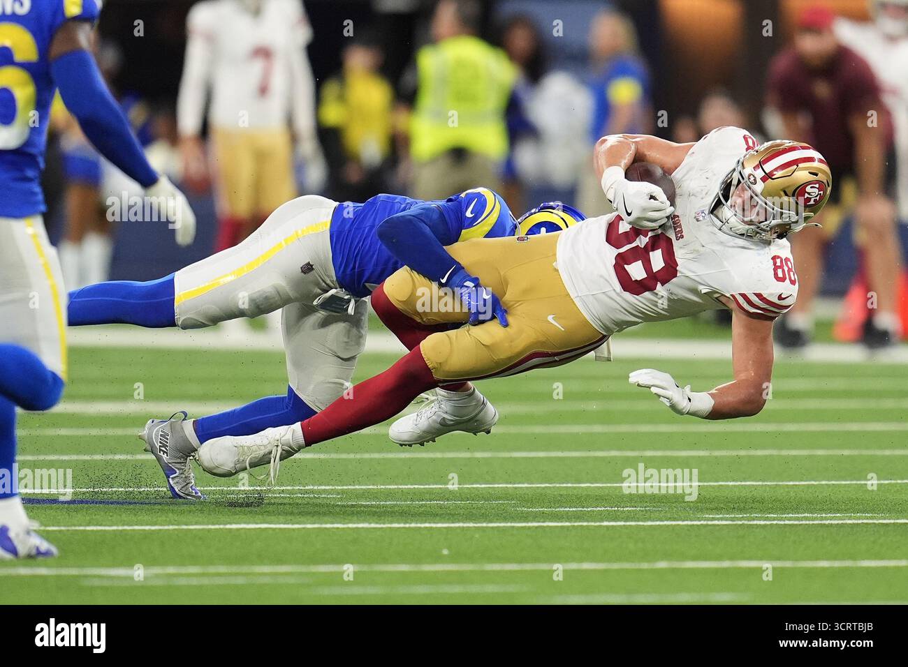 San Francisco 49ers tight end Jake Tonges (88) is tackled by Los ...
