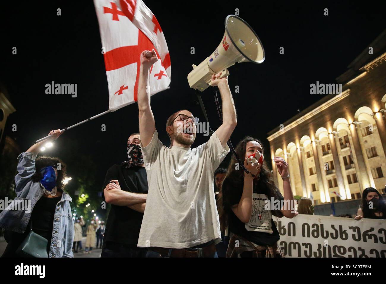 Gota Chanturia, a member of the Movement for Social Democracy, shouts ...