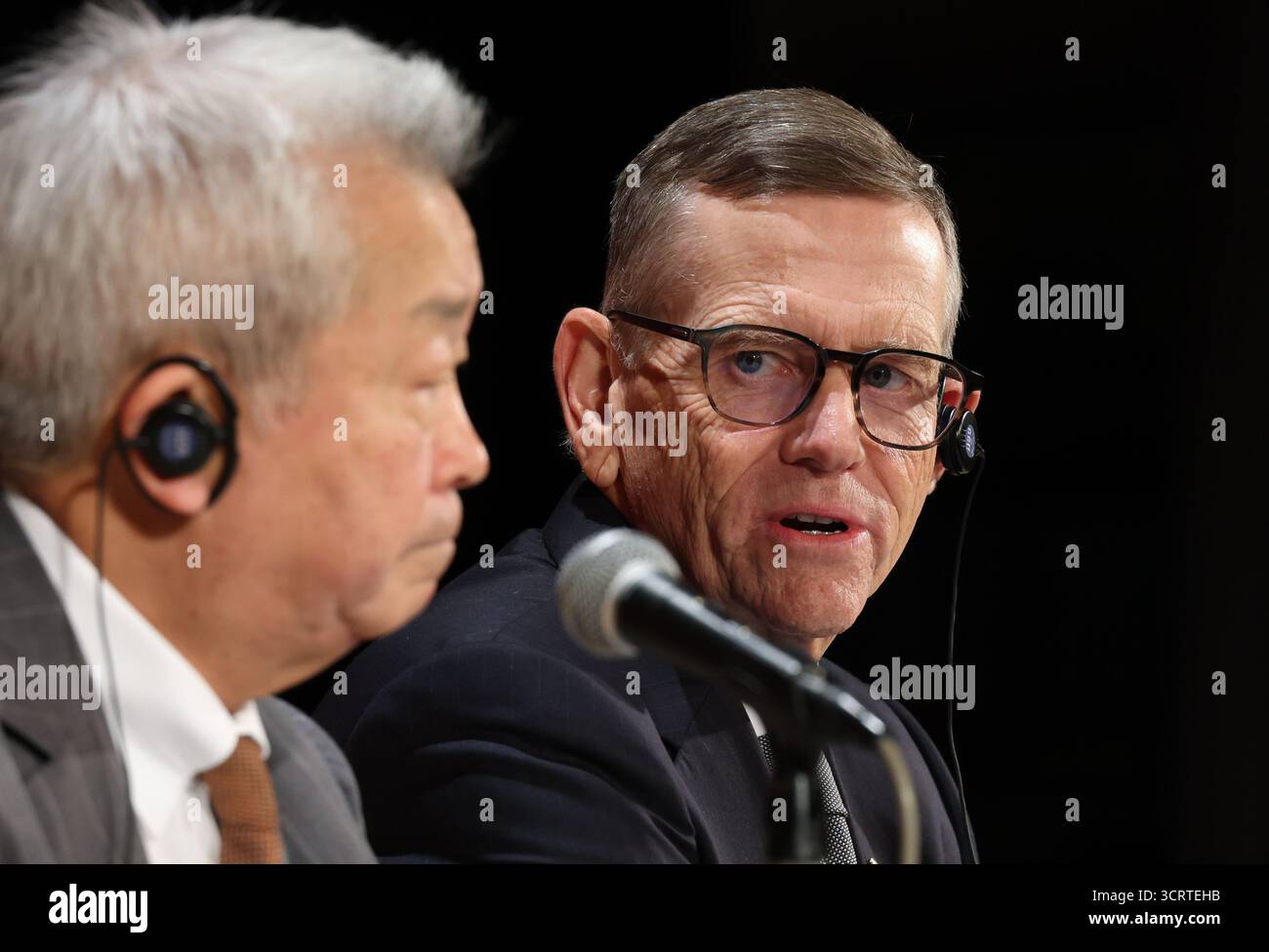 Nippon Telegraph and Telephone (NTT) Chairman Jun Sawada (left) and ...