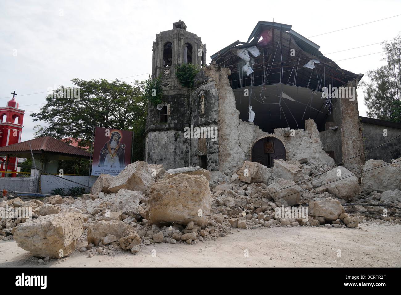 Large rocks occupy the front of the earthquake damaged Shrine of Santa ...