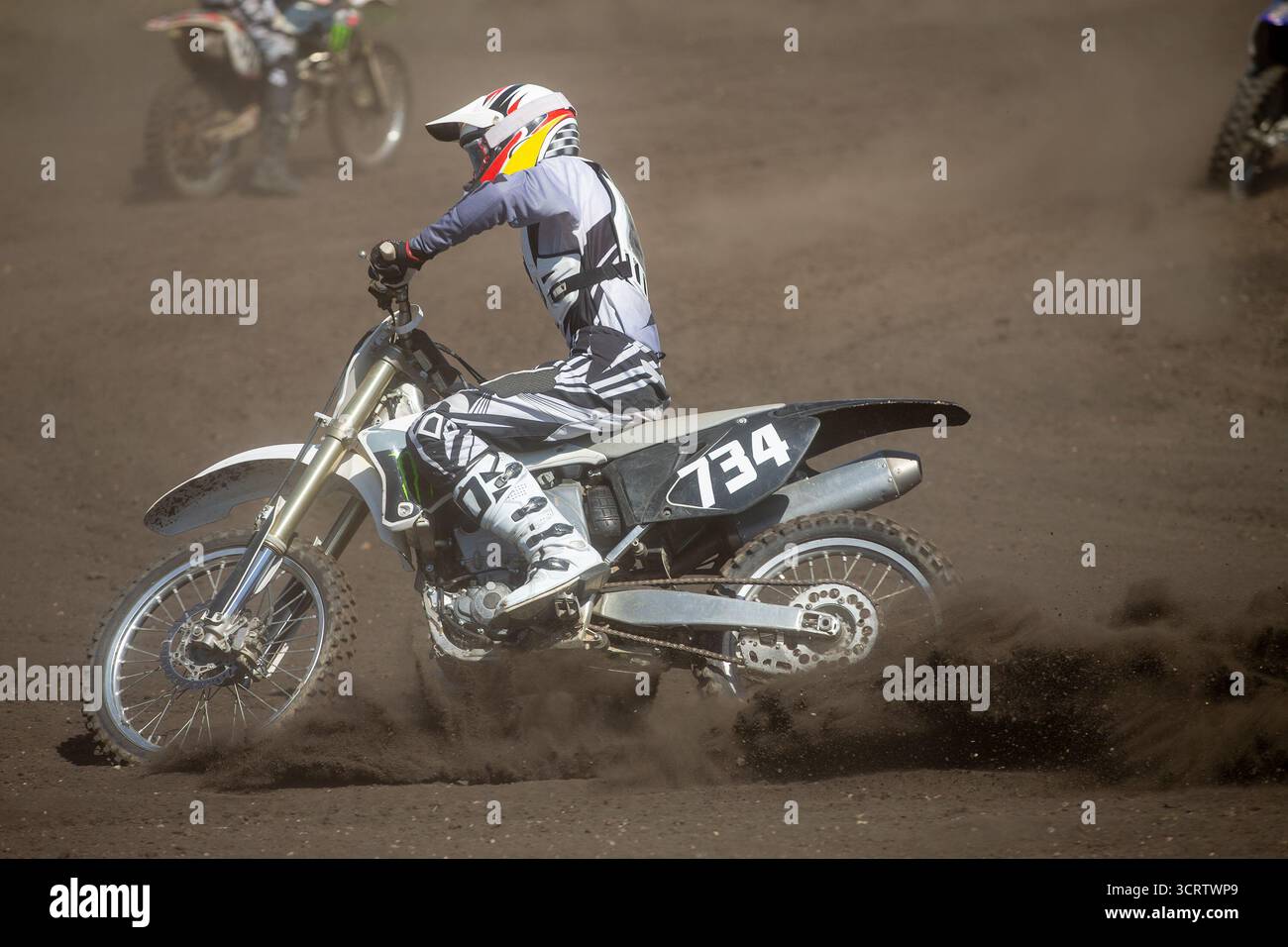 Three riders turning man on hi-res stock photography and images - Alamy