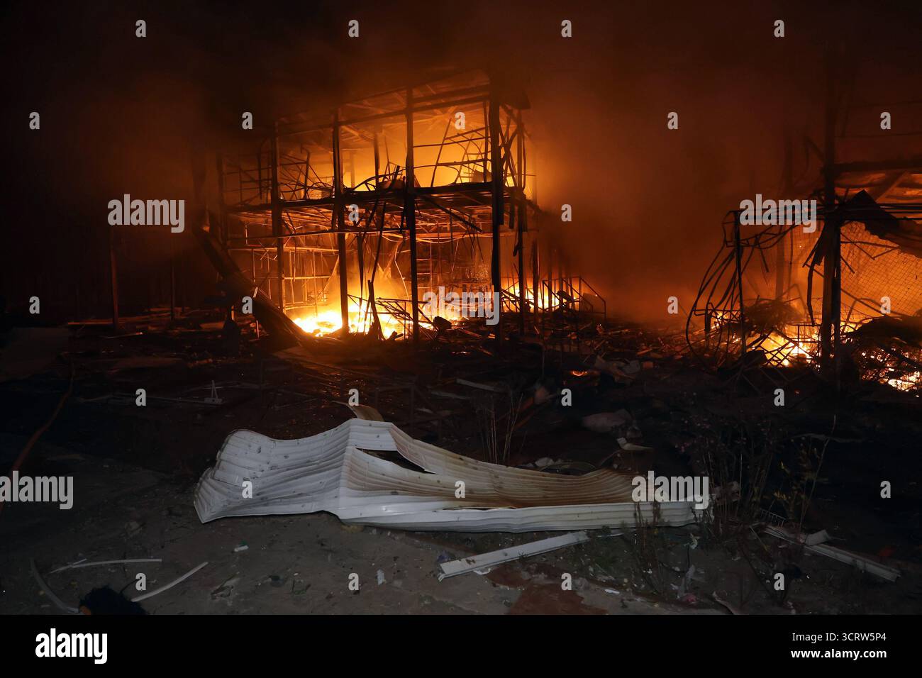 Non Exclusive: Flames engulf pavilions at Barabashovo market after a ...