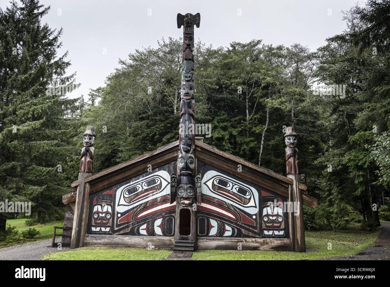 Totem poles at a Tlingit Clan House, Totem Bight State Historical Park ...