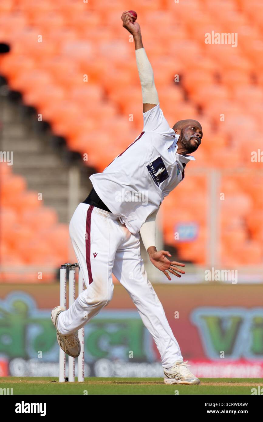 West Indies' captain Roston Chase bowls a delivery on the second day of ...