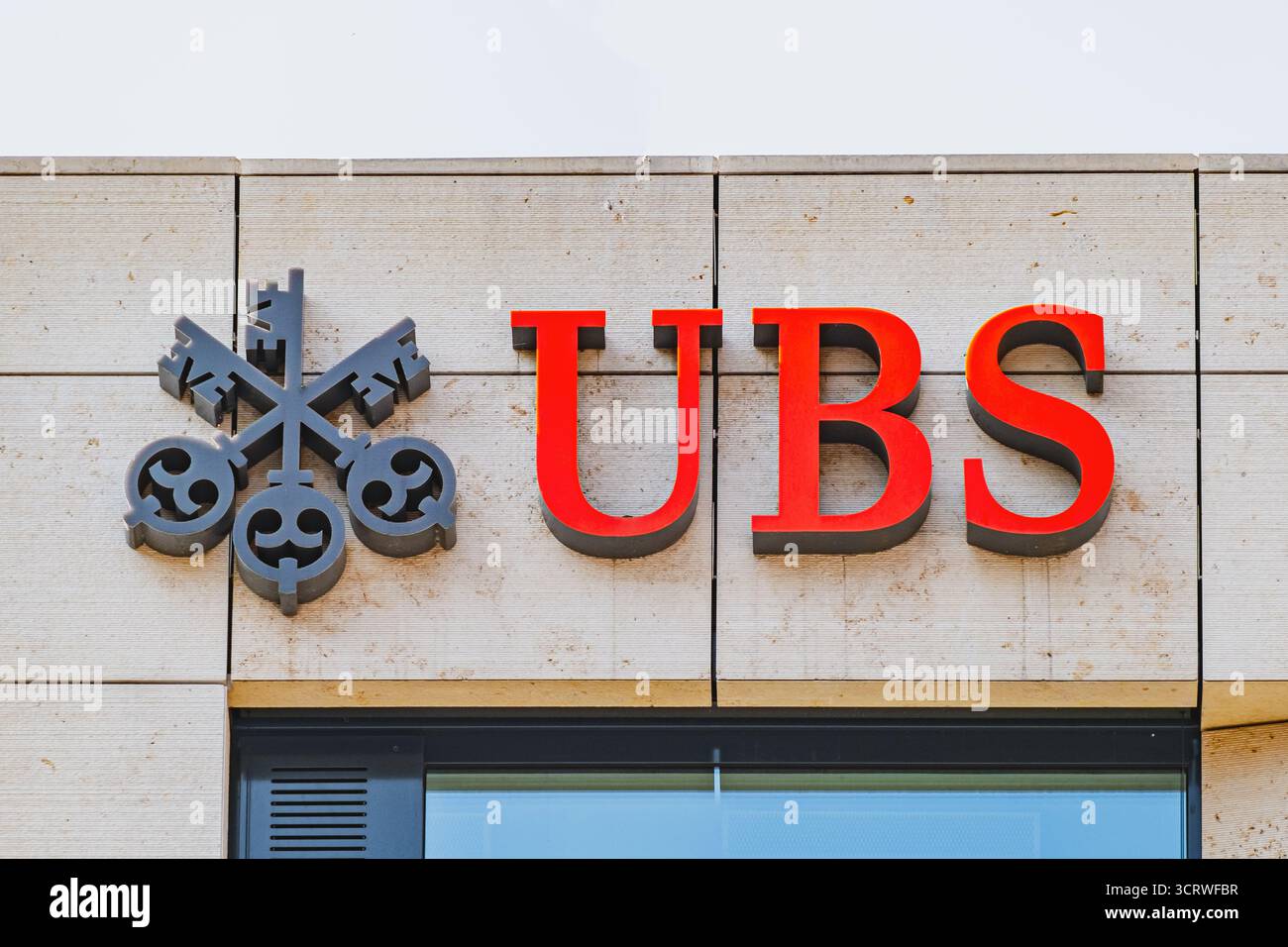UBS bank logo on the exterior of branch located in downtown area of ...